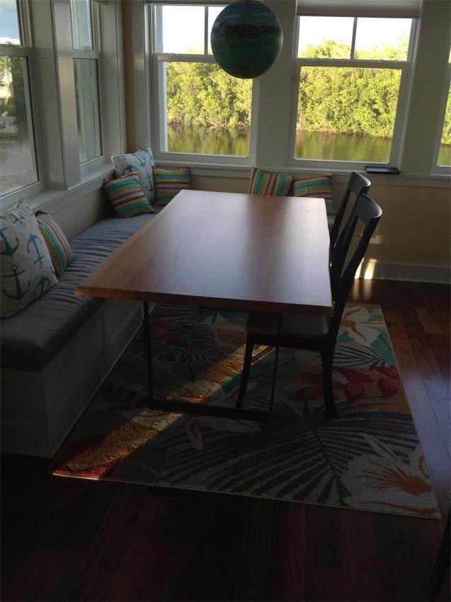 Planked Live Edge Bar Table with Steel T Base from DutchCrafters