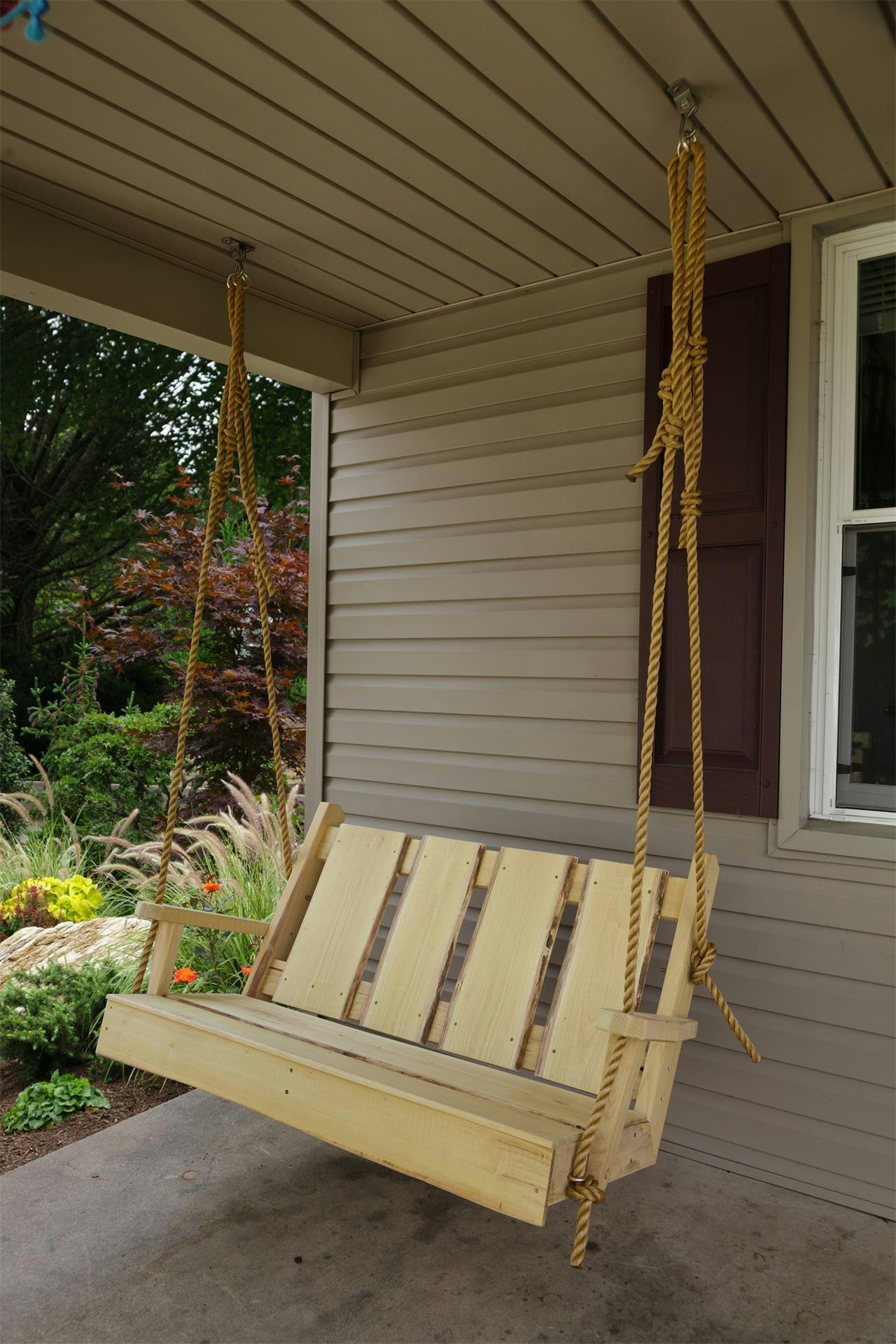 Rustic Wood Porch Swing with Live Edge from DutchCrafters Amish